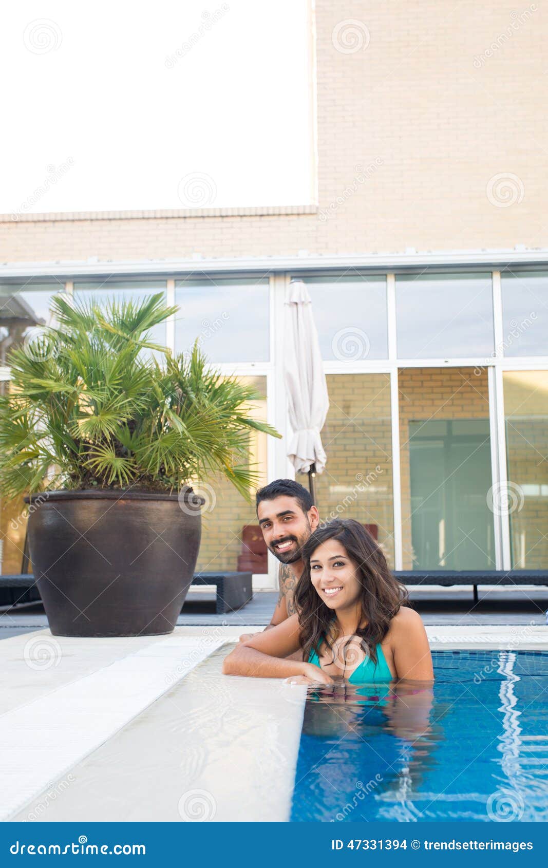 Couple in pool stock photo. Image of blue, caucasian - 47331394
