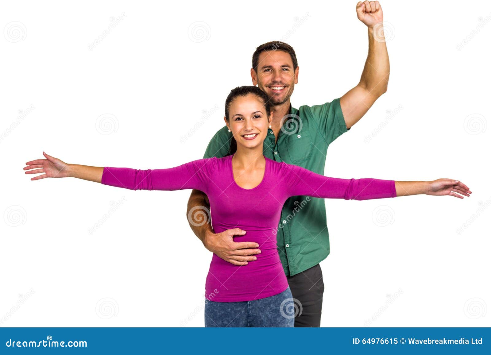Couple posing for camera stock image. Image of front - 64976615