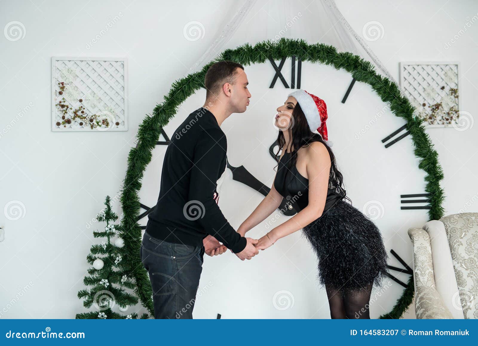 Couple Posing Near Clock Showing Midnight at Studio Stock Image - Image ...