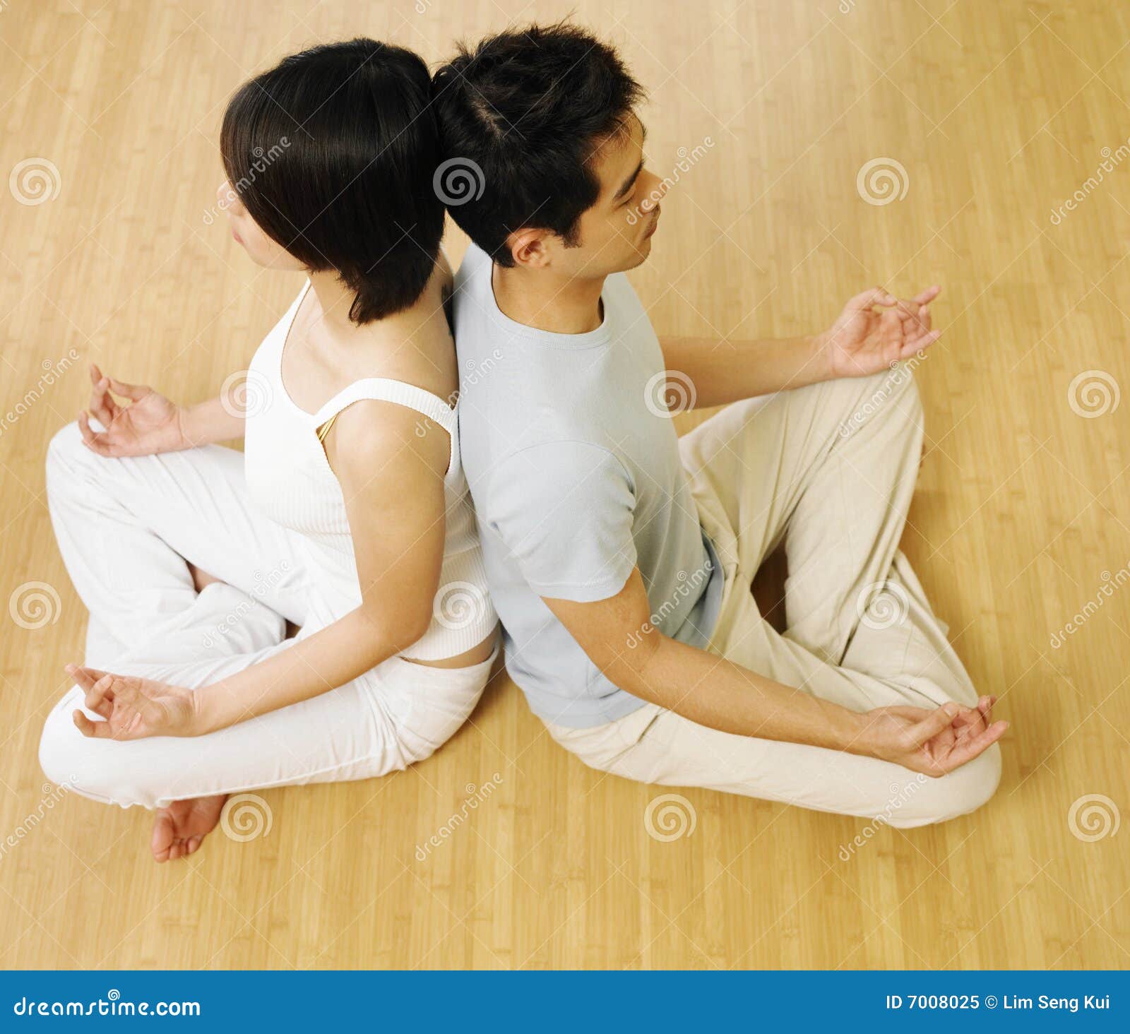 Couple Practicing Yoga Together Stock Image - Image of indoor, closed ...