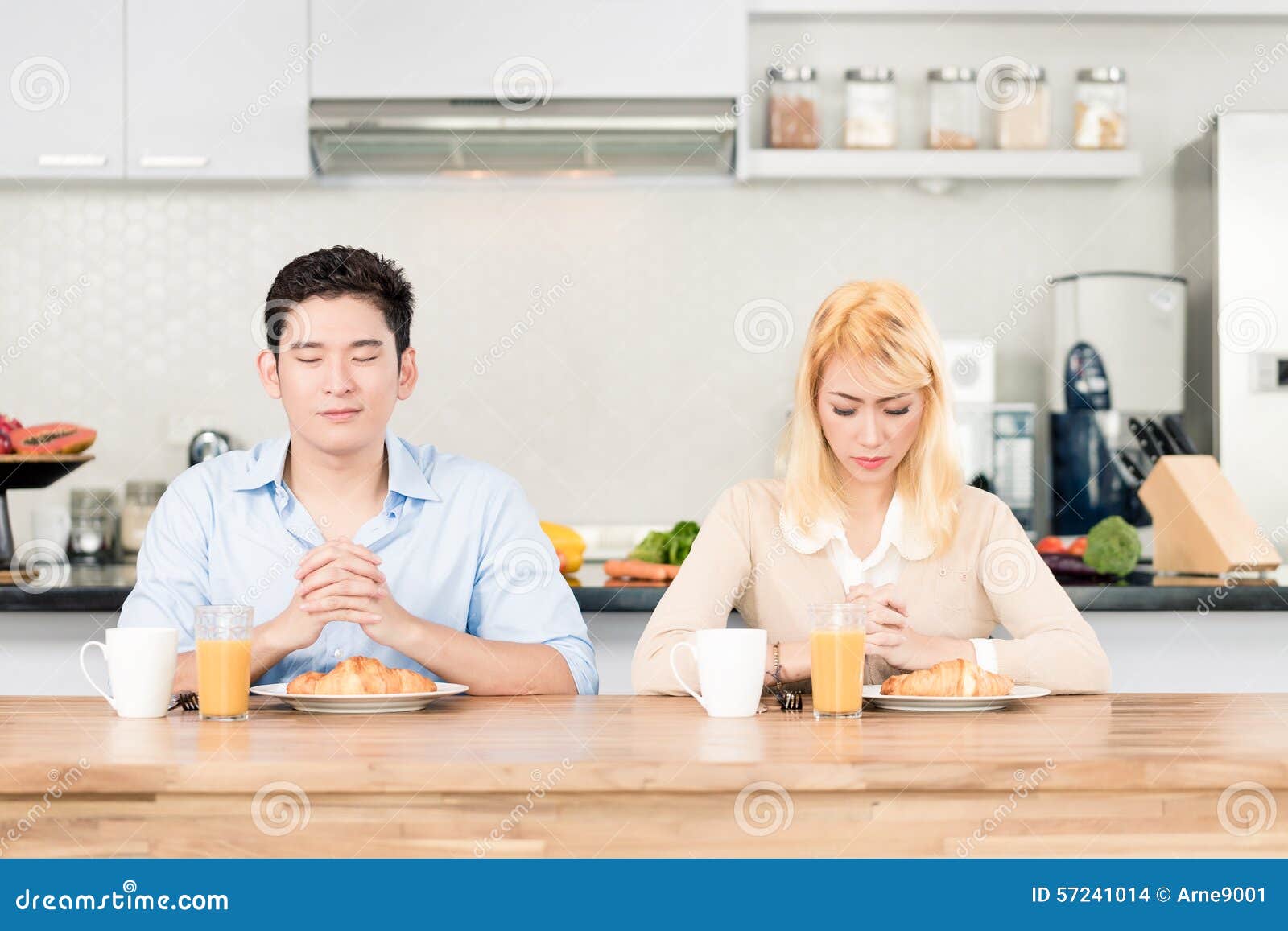 Couple Praying before Having Breakfast Together Stock Photo - Image of ...