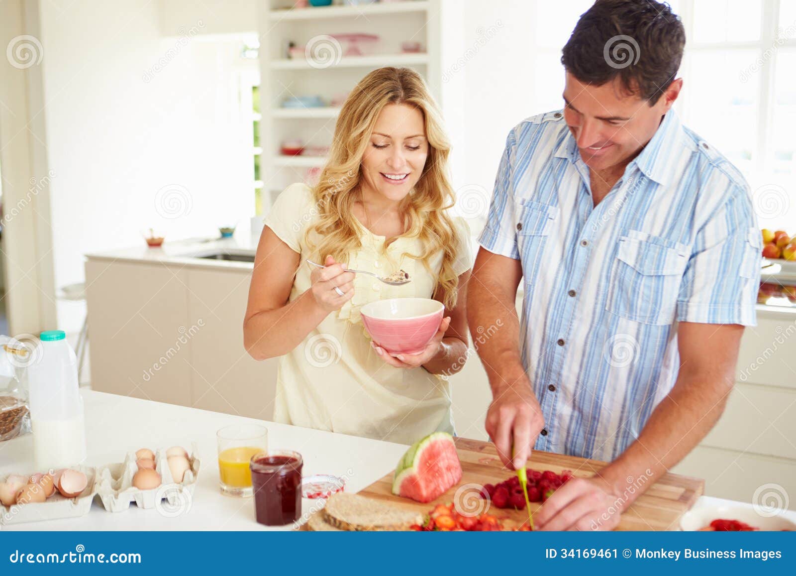 Couple Preparing Healthy Breakfast in Kitchen Stock Image - Image of ...