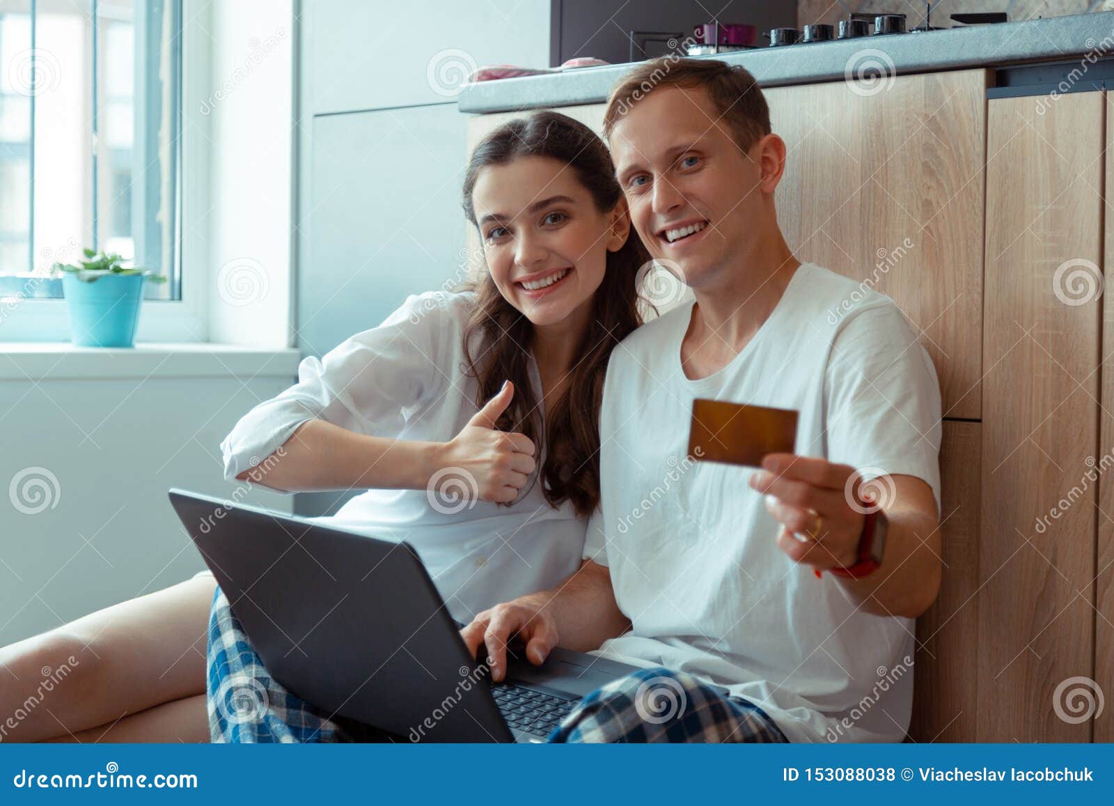 Couple Processing Online Payment while Shopping Online Stock Photo ...