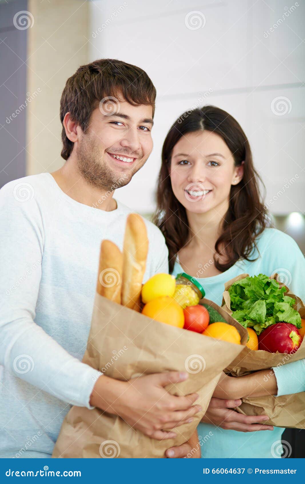 Couple with products stock image. Image of packet, looking - 66064637