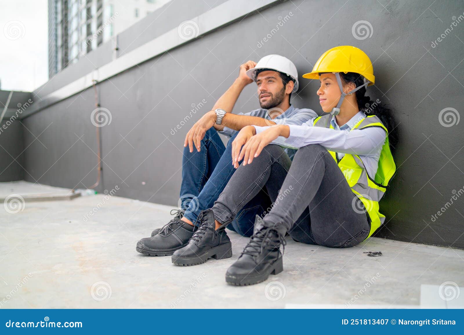 Couple Professional Engineer or Technician Sit on the Floor of Terrace ...