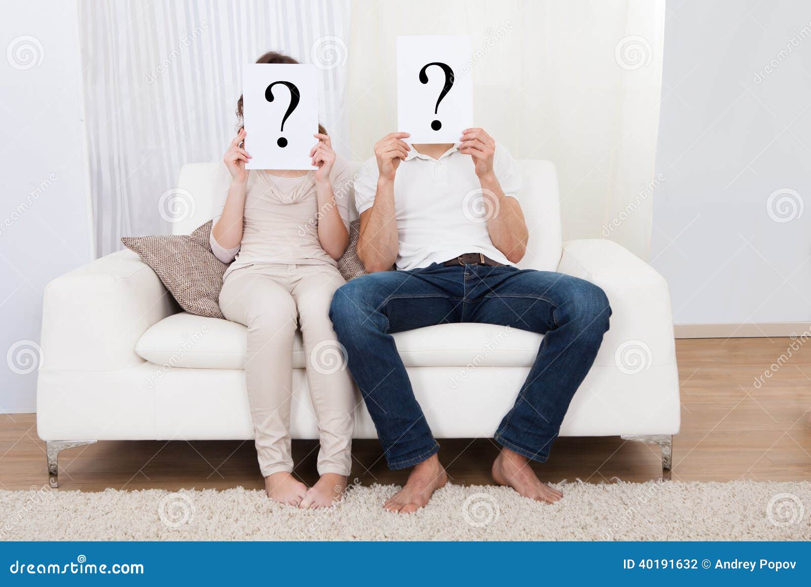 Couple with question marks stock photo. Image of interior - 40191632