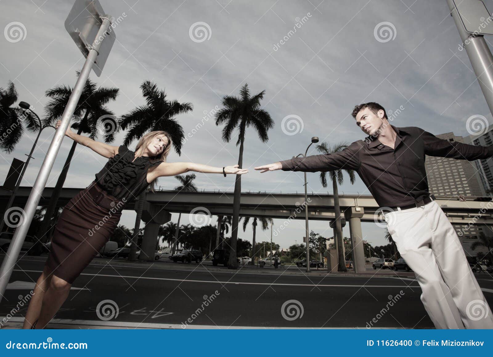 Couple Reaching for Each Other Stock Photo - Image of couple, person ...