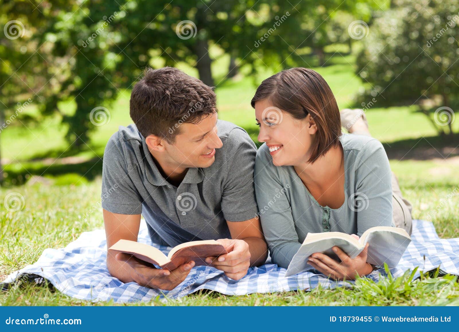 Couple reading a book stock image. Image of happiness - 18739455