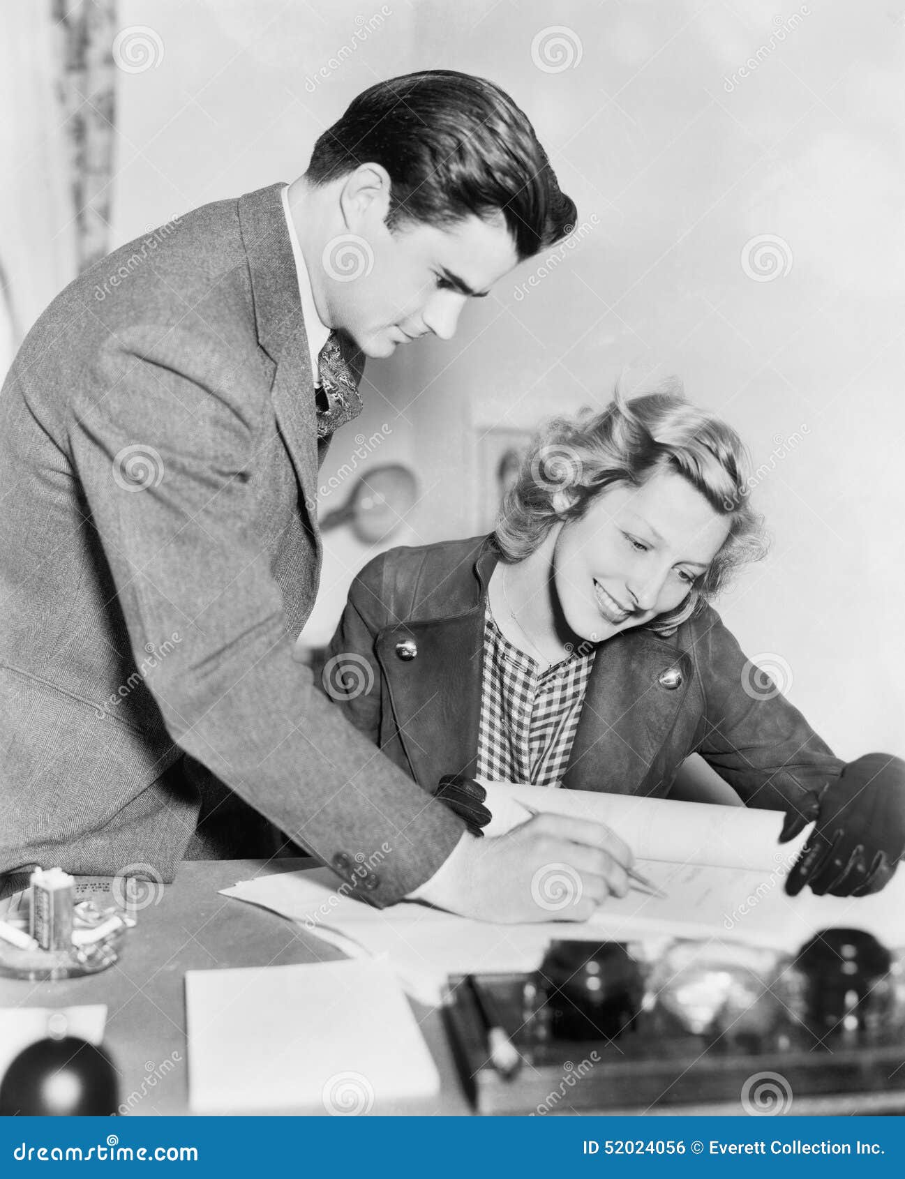 Couple Reading a Document Together Stock Photo - Image of delight ...