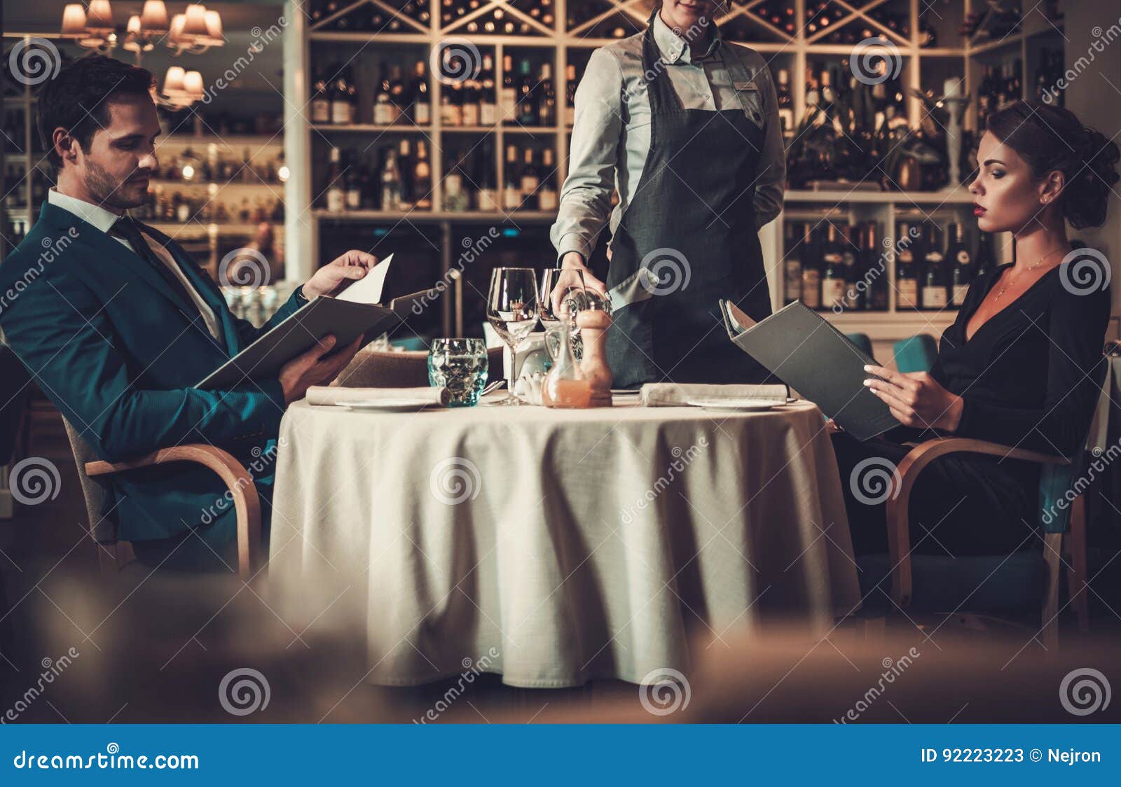Couple Reading Menu in a Restaurant Stock Image - Image of celebration ...