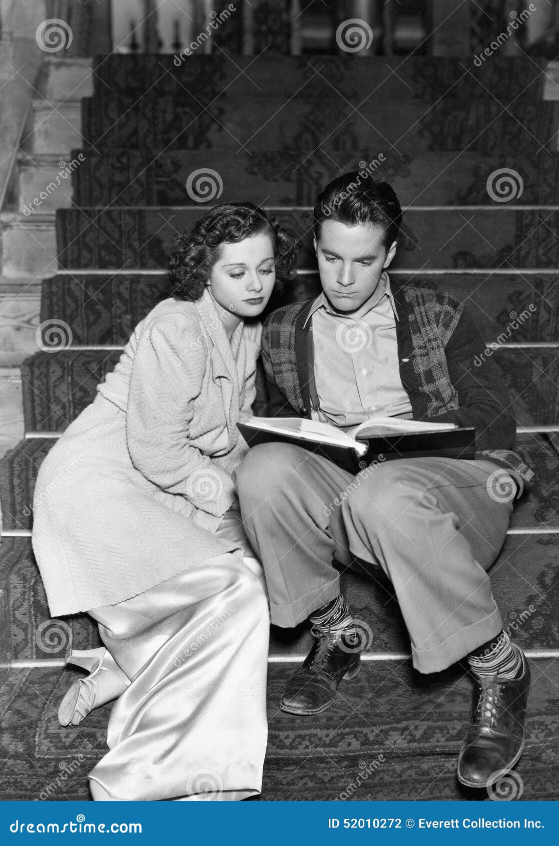 Couple Reading Together on Stairs Stock Photo - Image of educational ...