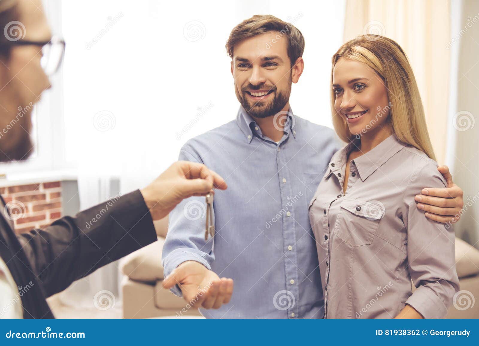 Couple and a realtor stock photo. Image of adult, beautiful - 81938362