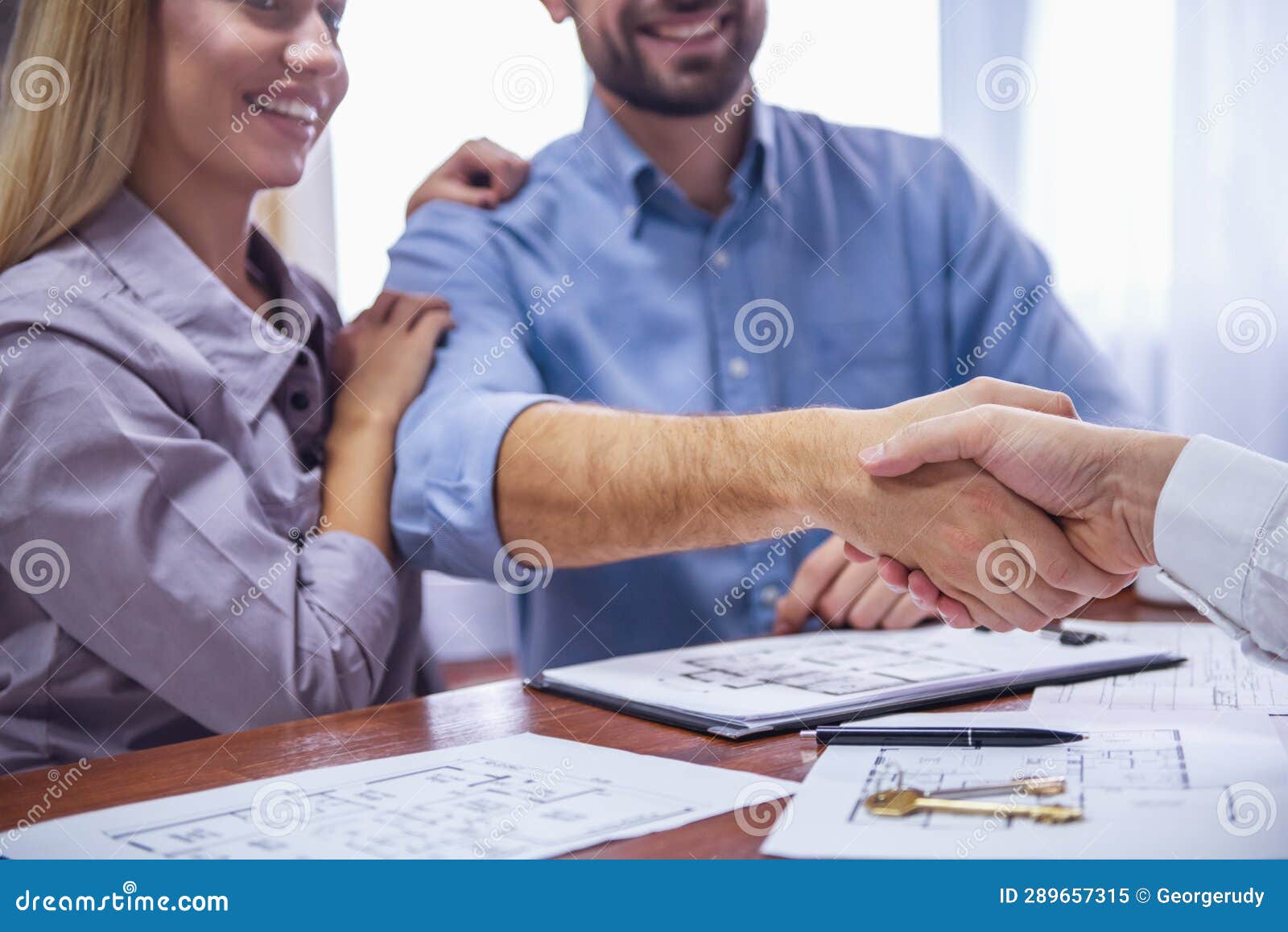 Couple and a realtor stock image. Image of land, people - 289657315