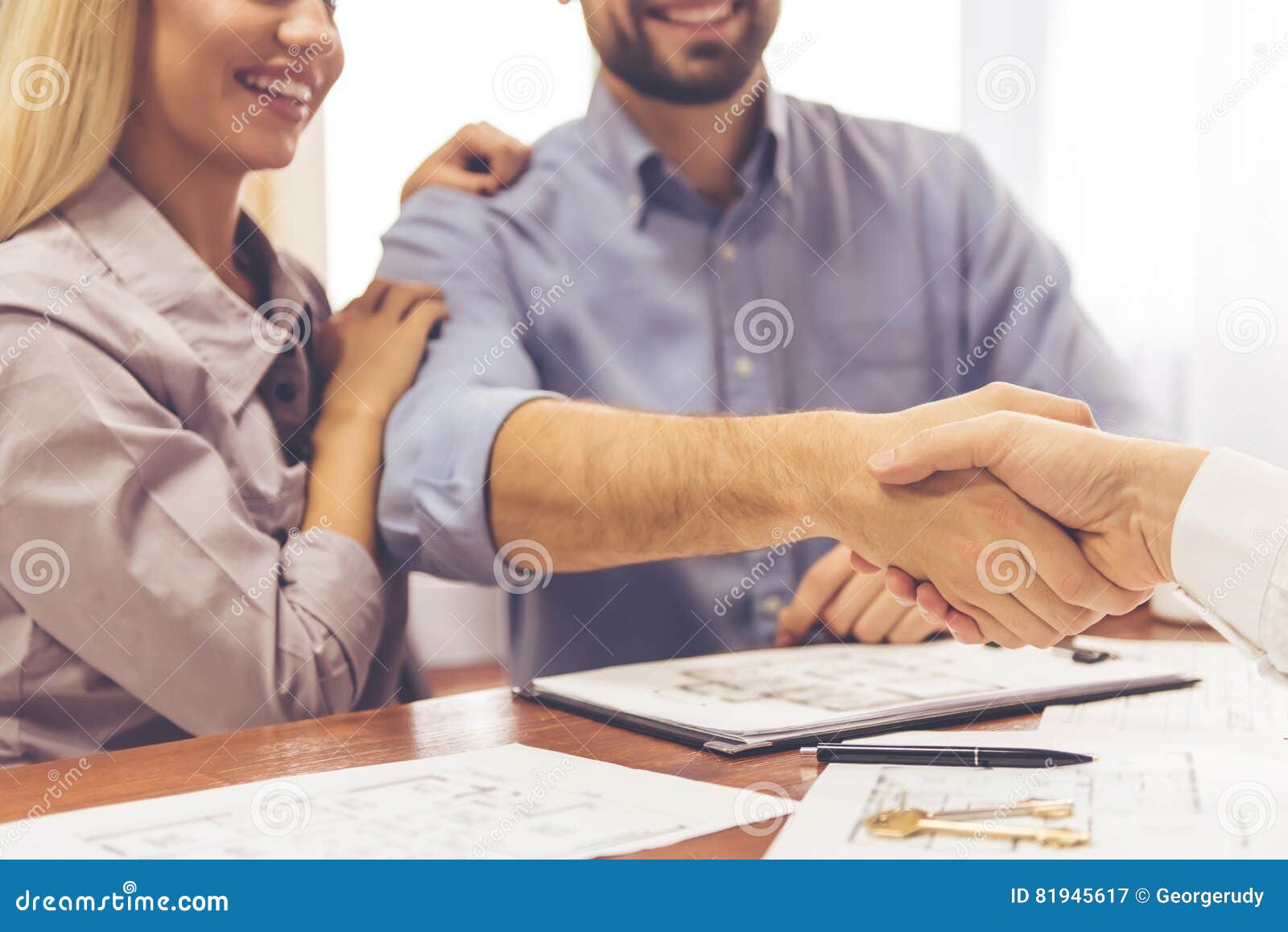 Couple and a realtor stock image. Image of couple, establishment - 81945617