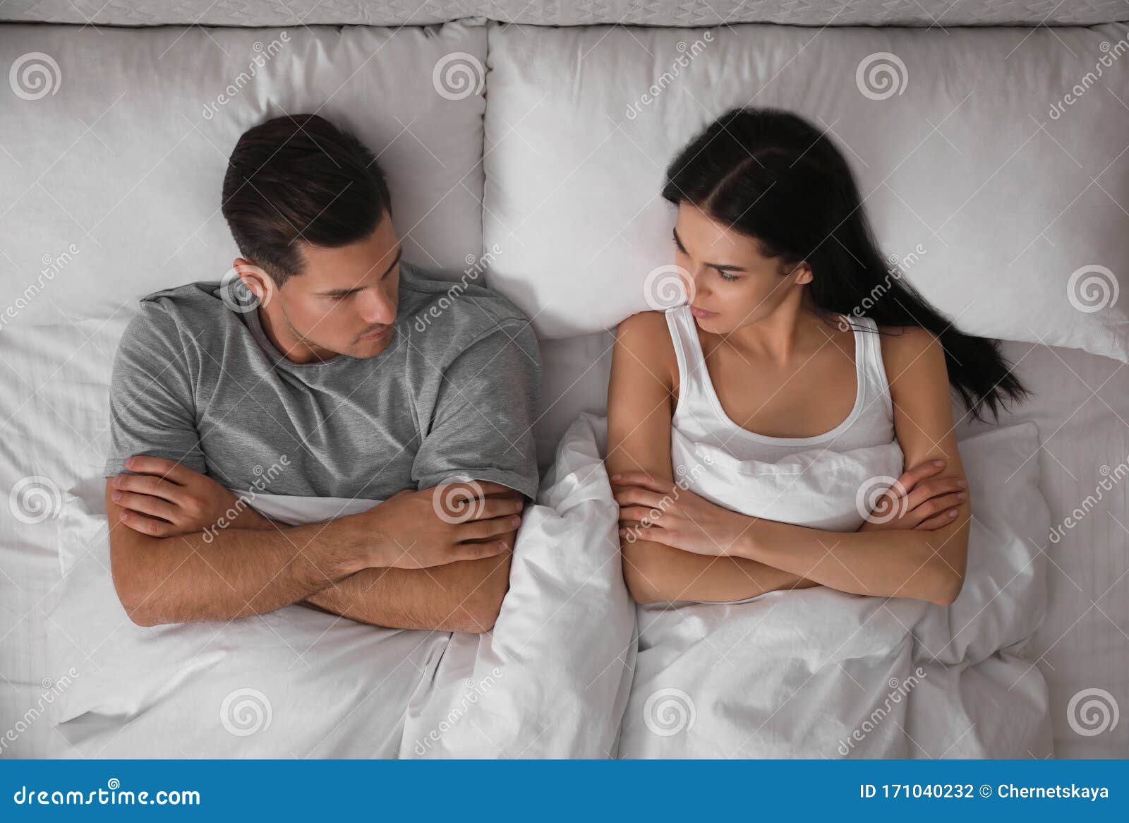 Couple with Relationship Problems in Bed at Home, Top View Stock Photo ...