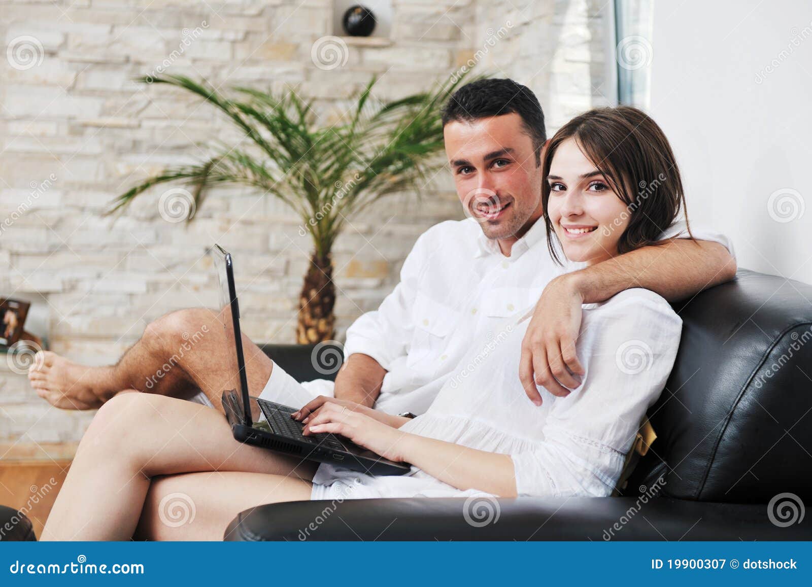 Couple Relax and Work on Laptop Computer at Home Stock Image - Image of ...