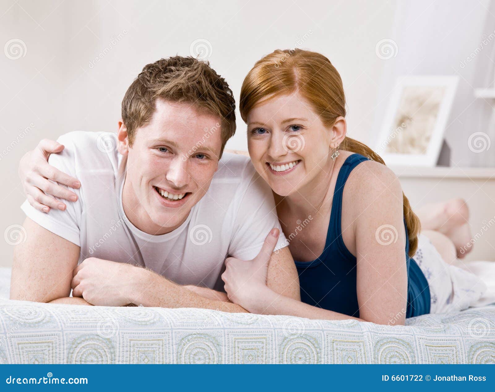 Couple Relaxing in Bed and Hugging Stock Photo - Image of european ...