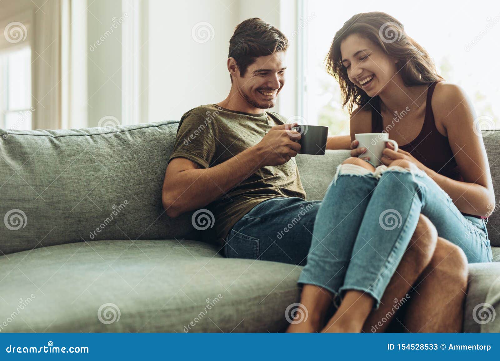 Couple Relaxing At Home With Coffee Stock Image Image Of Room
