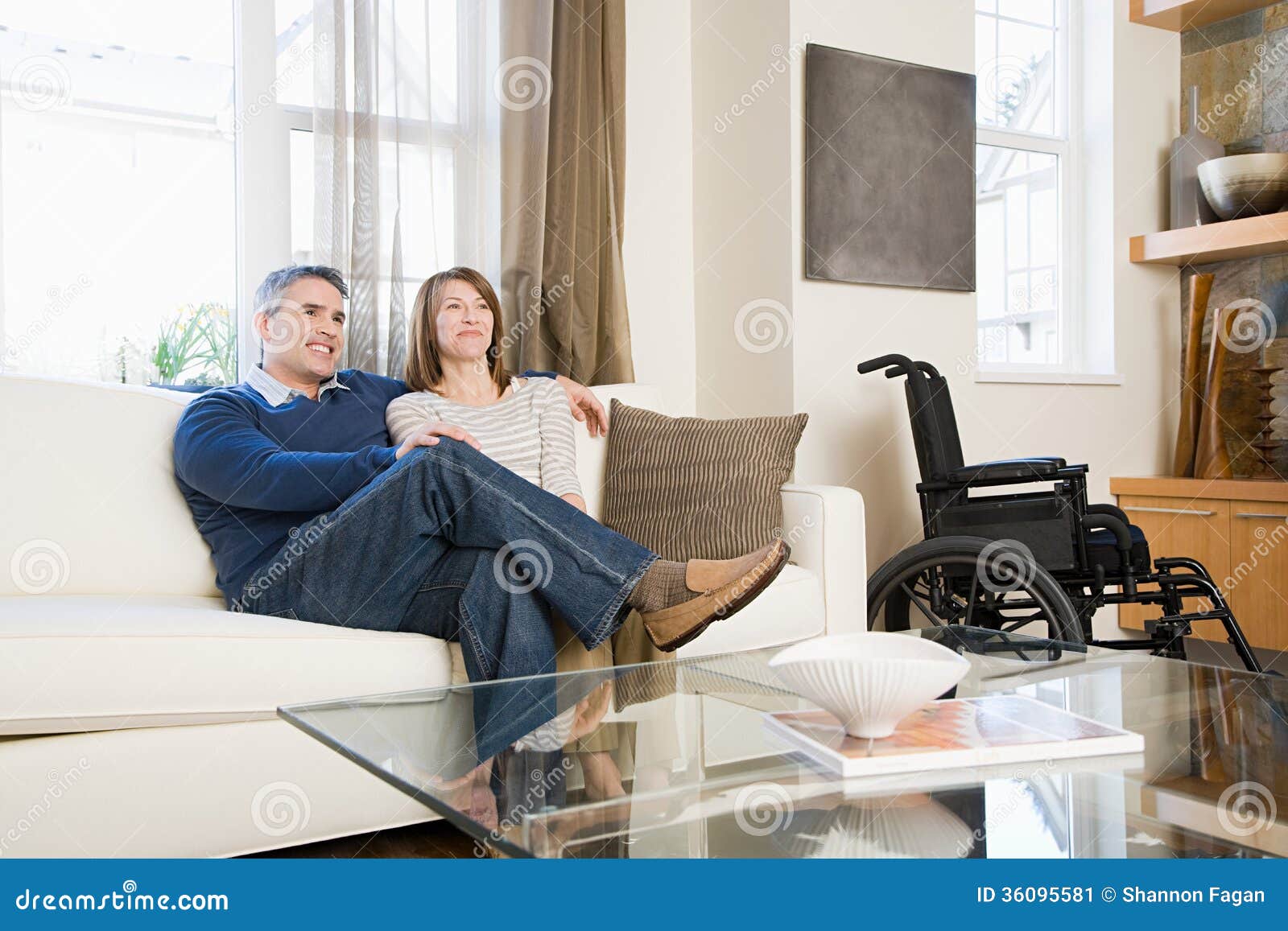 Couple Relaxing in the Living Room Stock Image - Image of amuse, aged ... Couple Relaxing in the Living Room Stock Image - Image of amuse, aged ...