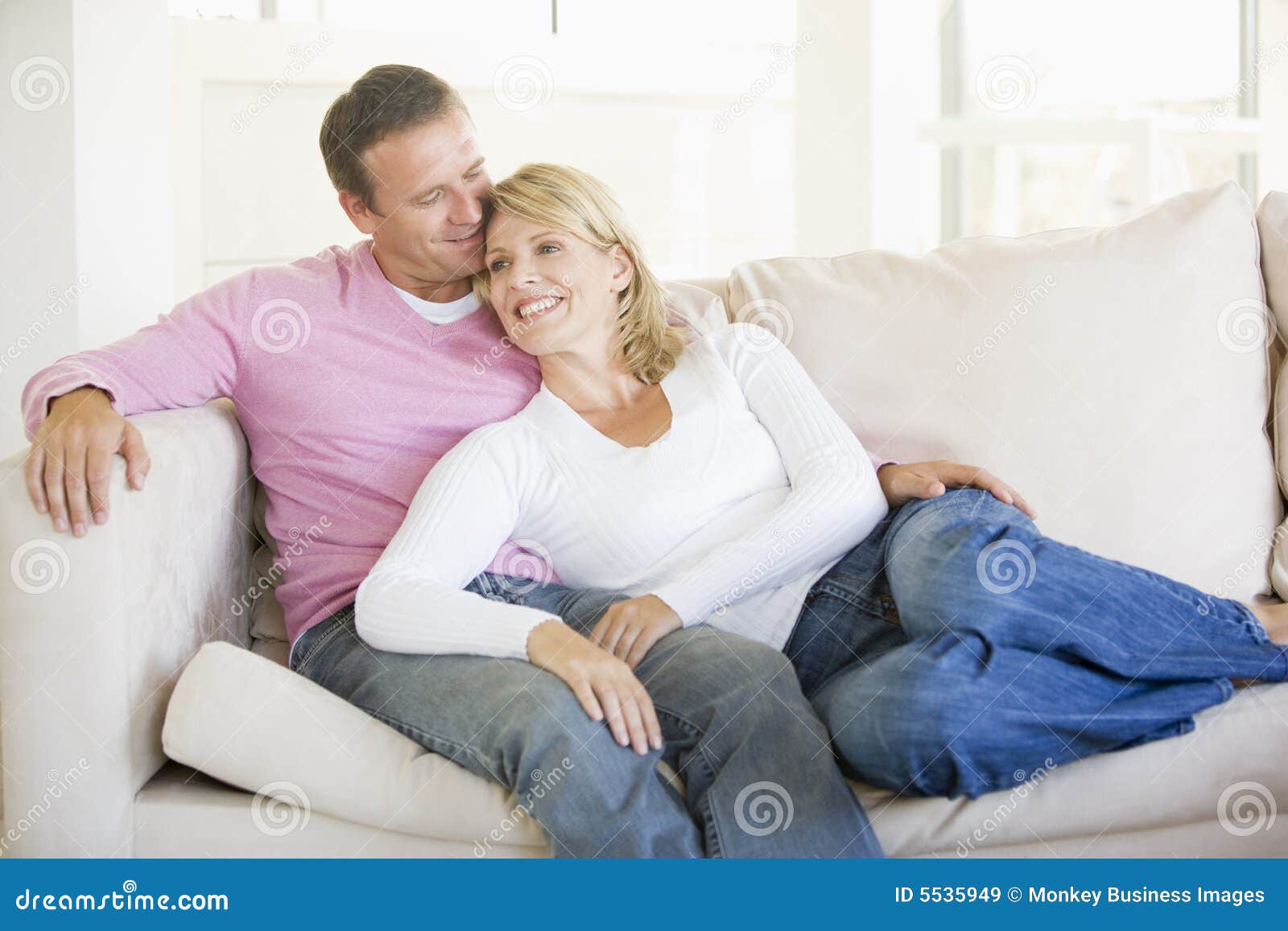 Couple Relaxing in Living Room and Smiling Stock Image - Image of smile ...