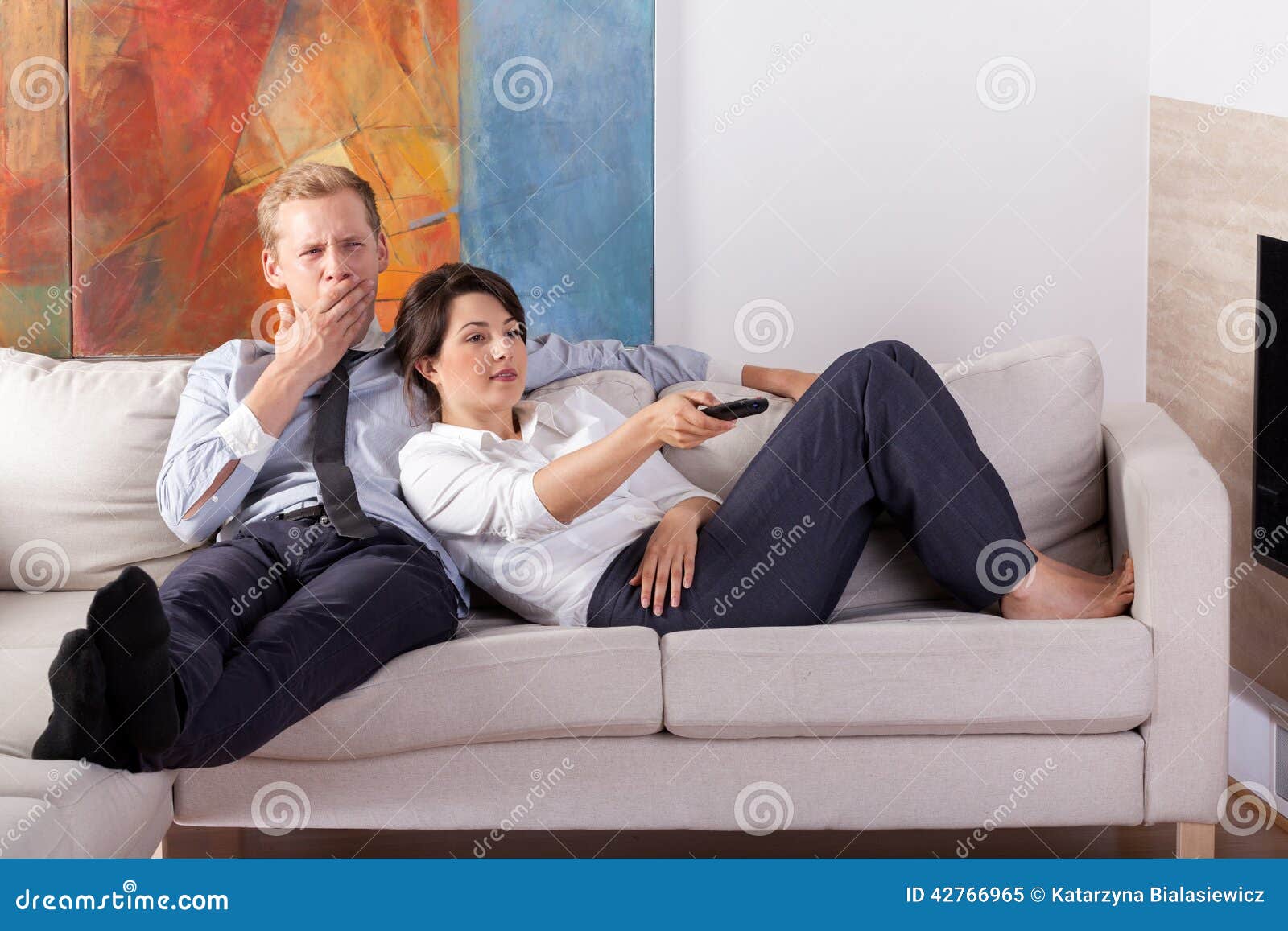Couple Relaxing after Long Day Stock Image - Image of long, couch: 42766965