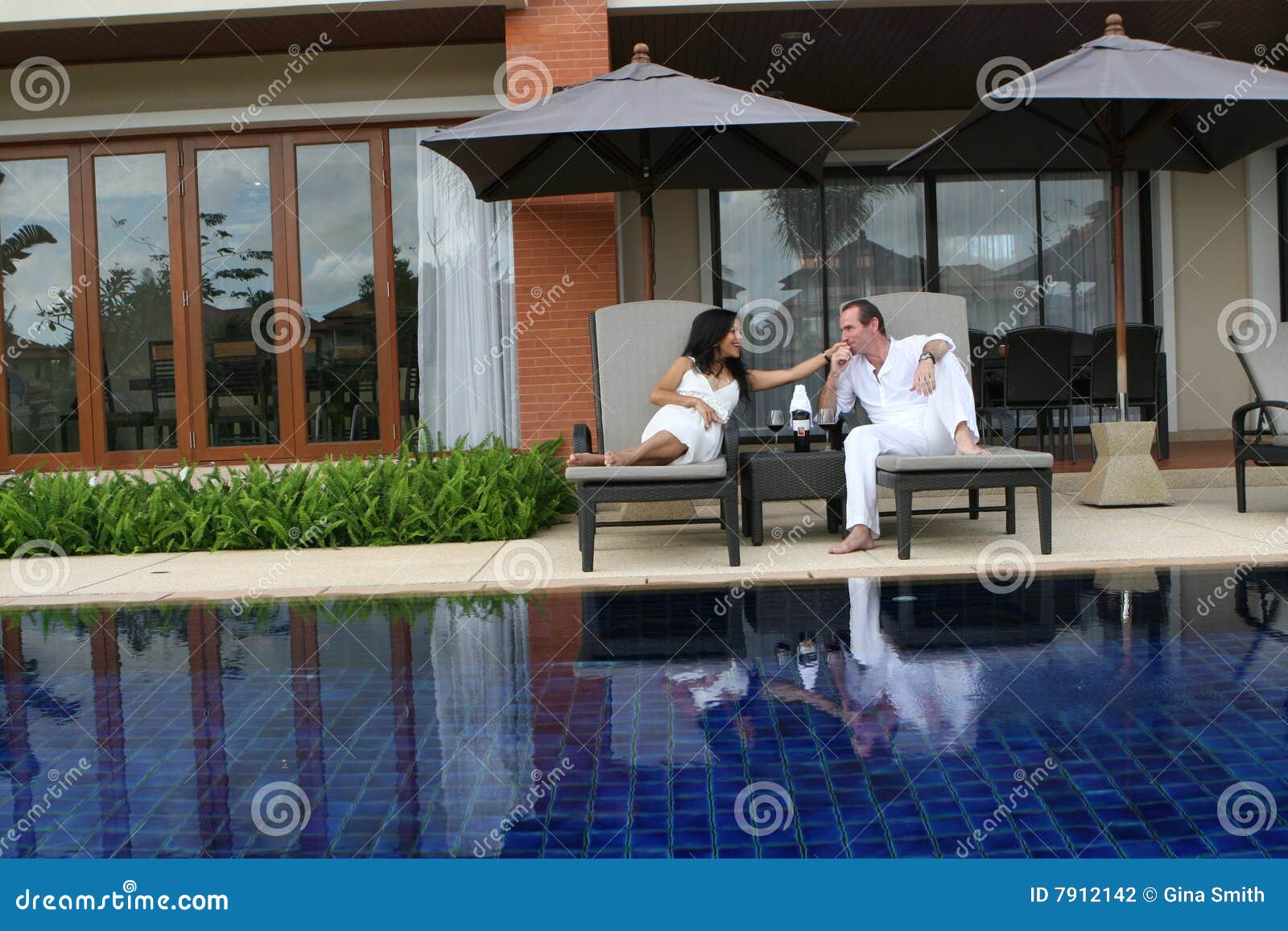 Couple at a resort stock photo. Image of building, pretty - 7912142