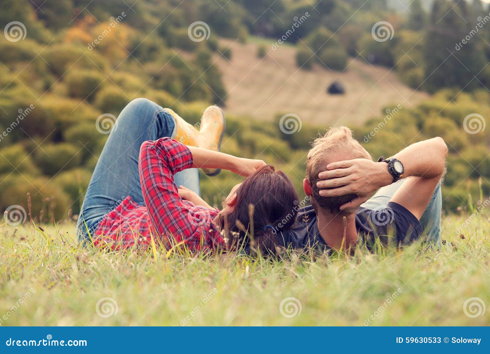 Couple Rest in Green Grass on the Hill in Country Side Stock Image ...