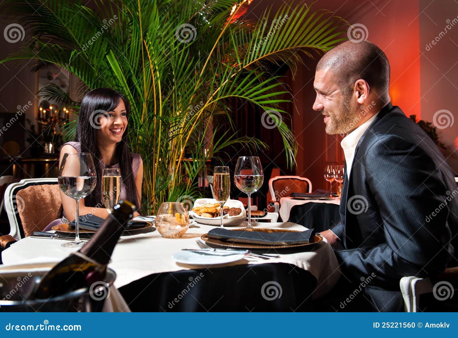 Couple at restaurant stock photo. Image of alcohol, beautiful - 25221560