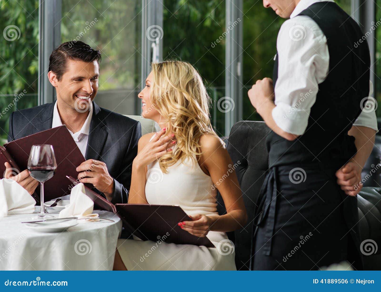 Couple in a restaurant stock photo. Image of lady, dinner - 41889506