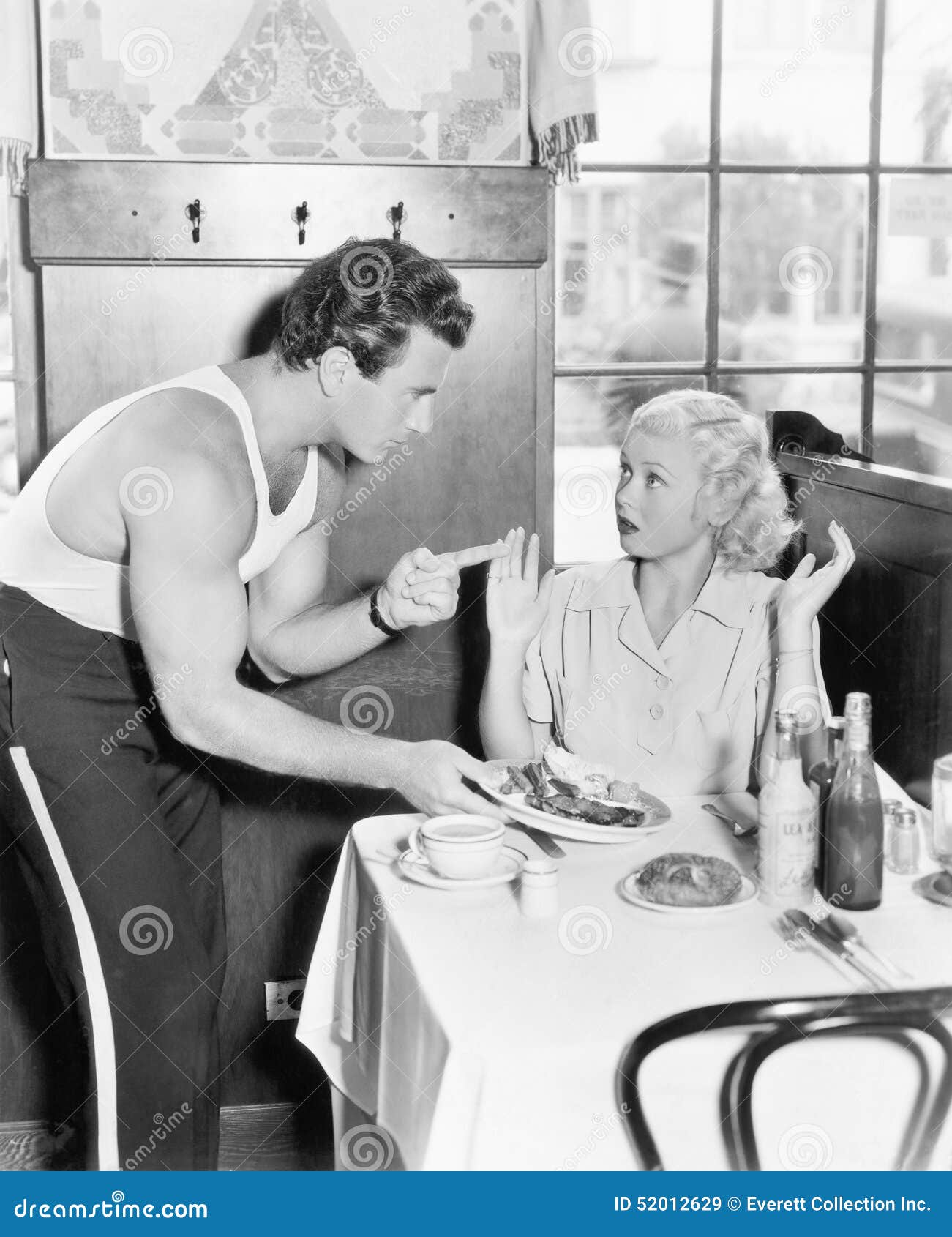 Couple in a Restaurant Having an Argument Over Food Stock Image - Image ...