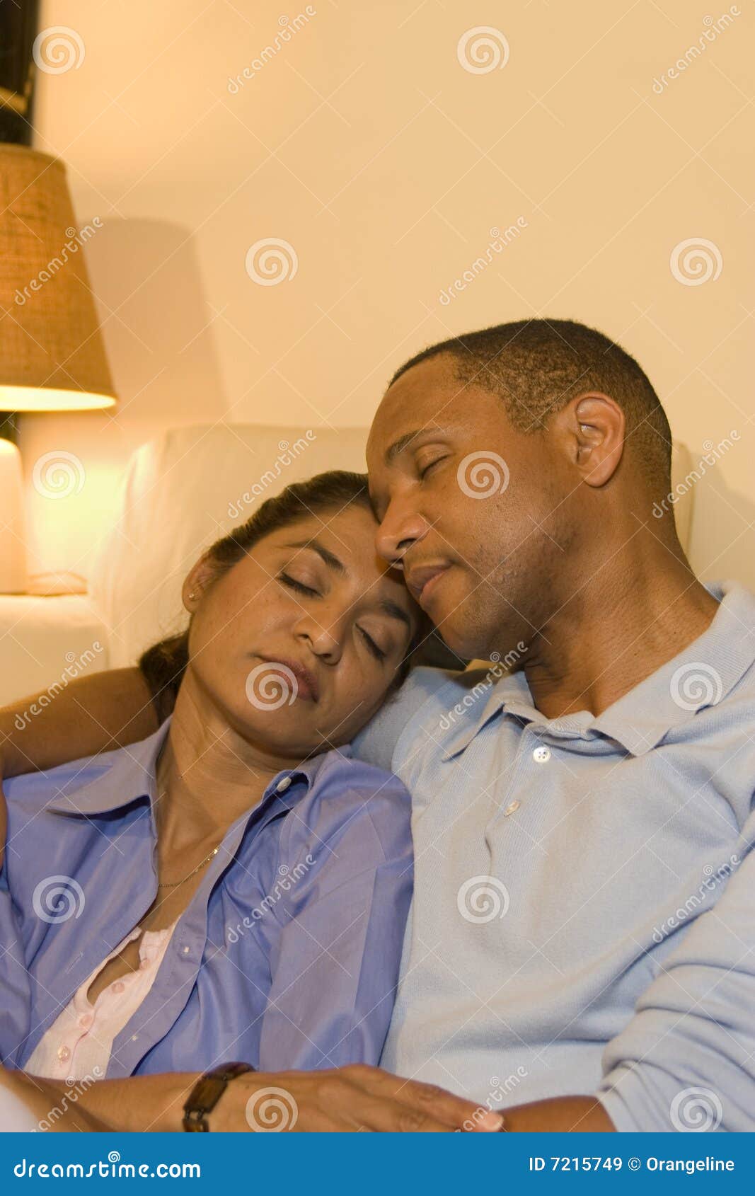 Couple Resting stock image. Image of house, couch, black - 7215749