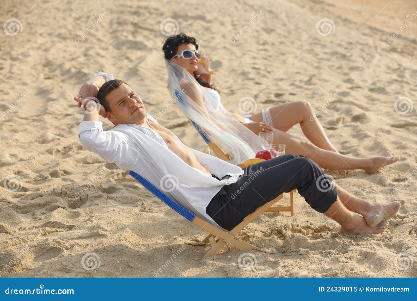 Couple Resting on the Beach Stock Image - Image of male, leisure: 24329015