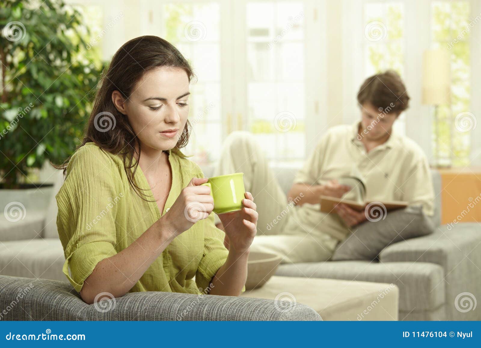 Couple resting at home stock photo. Image of domestic - 11476104