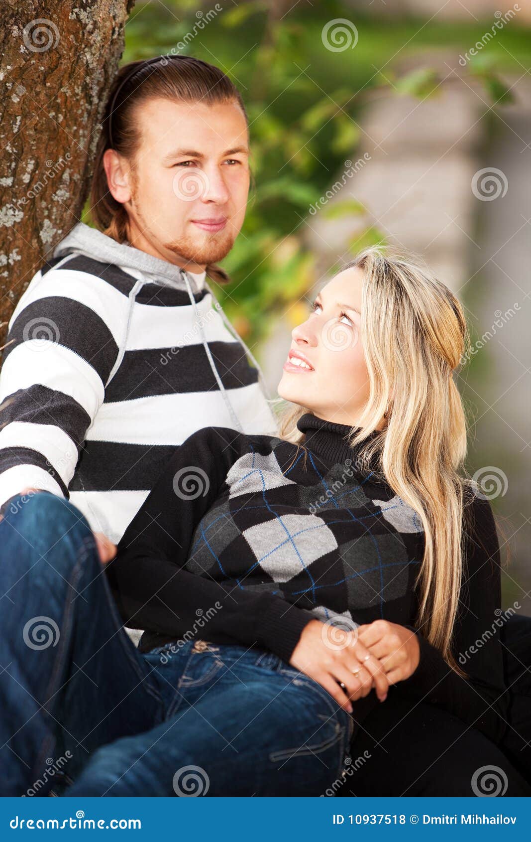 Couple resting outdoors stock photo. Image of female - 10937518