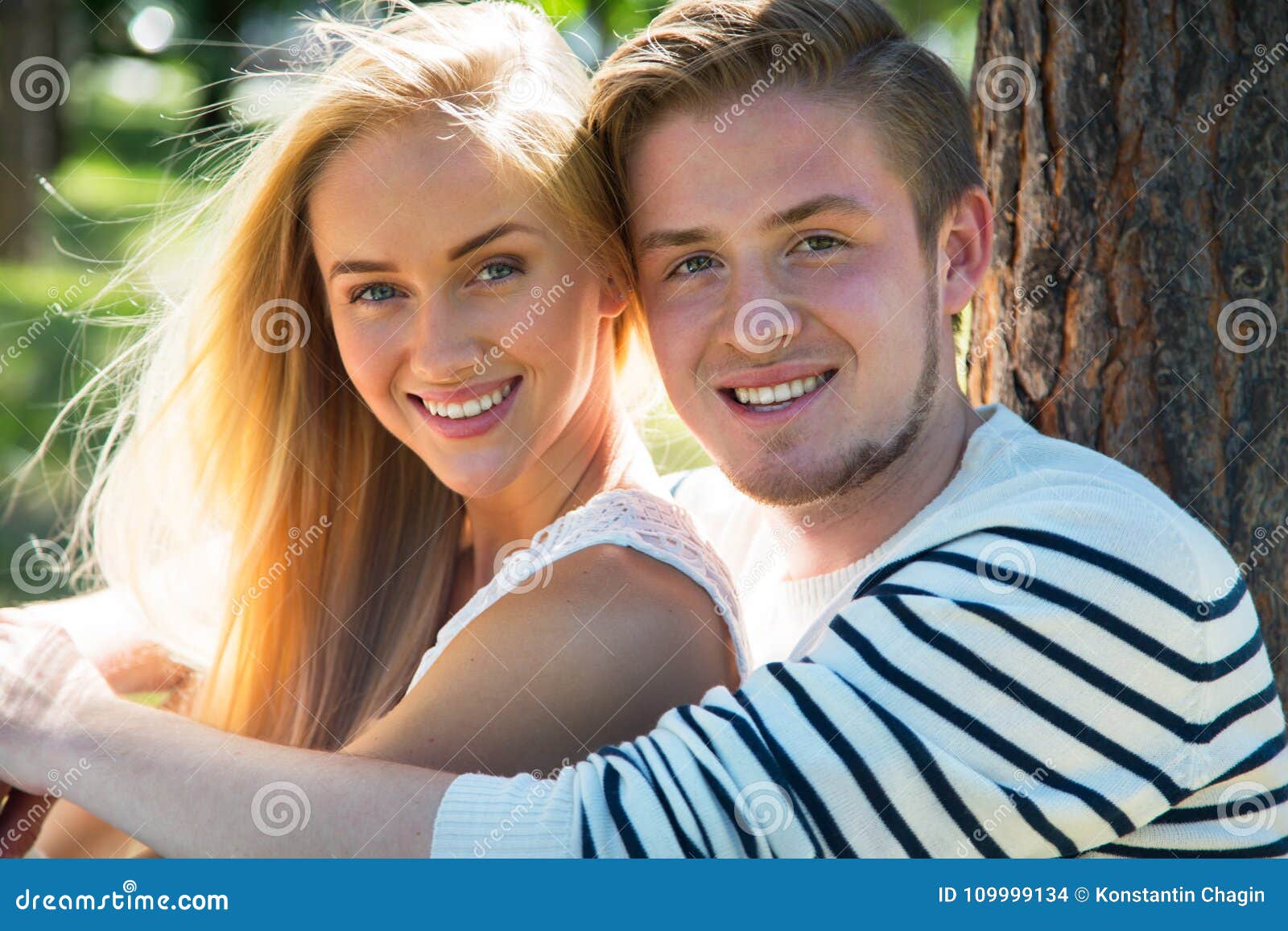 Couple Resting Under a Tree Stock Photo - Image of leisure, lady: 109999134