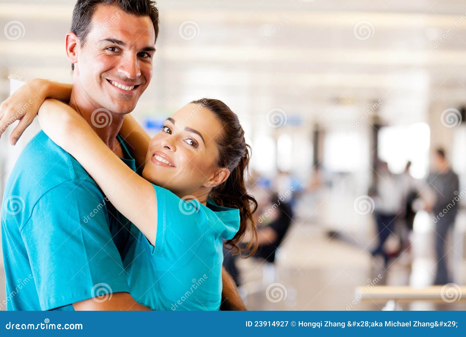 Couple reunion at airport stock image. Image of joyful - 23914927