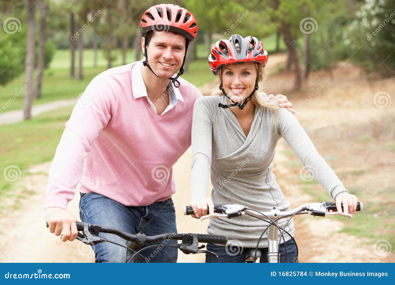 Couple Riding Bicycle In Park Stock Images - Image: 16825784