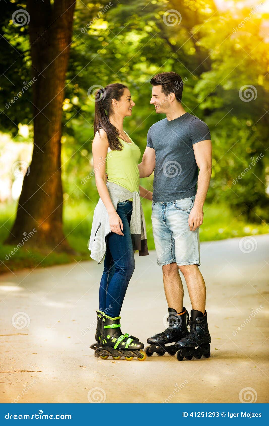 Couple on roller skates stock image. Image of lovers - 41251293