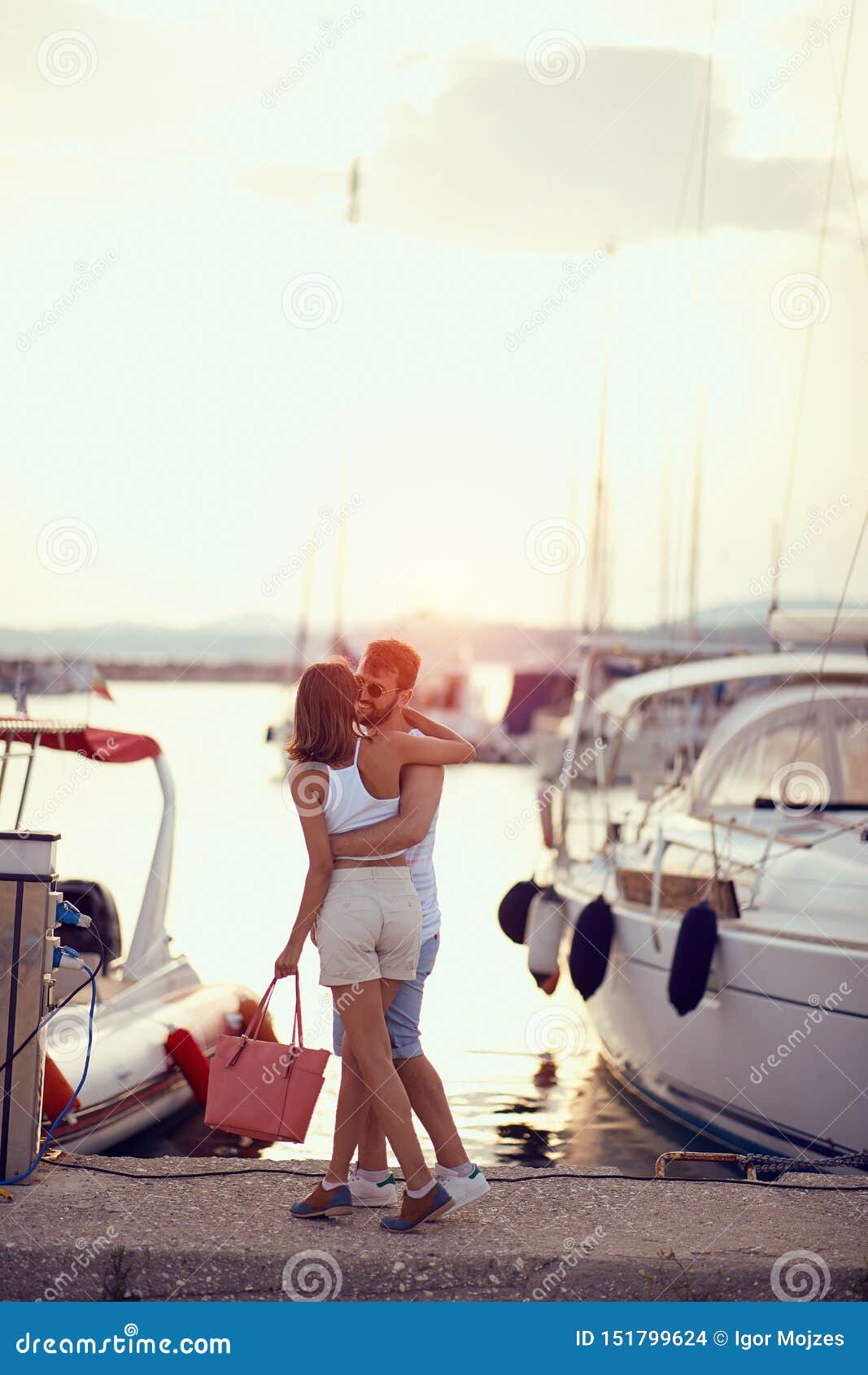 Couple on Romantic Walking on the Dock at Sunset Stock Photo - Image of ...