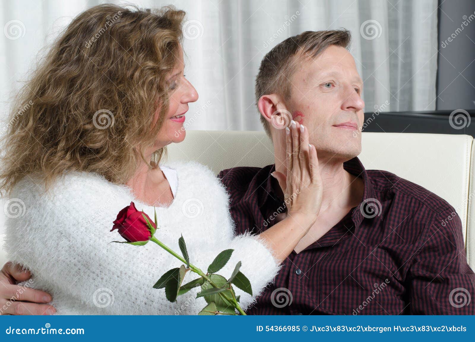 Couple with Rose Kissing on Couch Stock Image - Image of enjoy ...