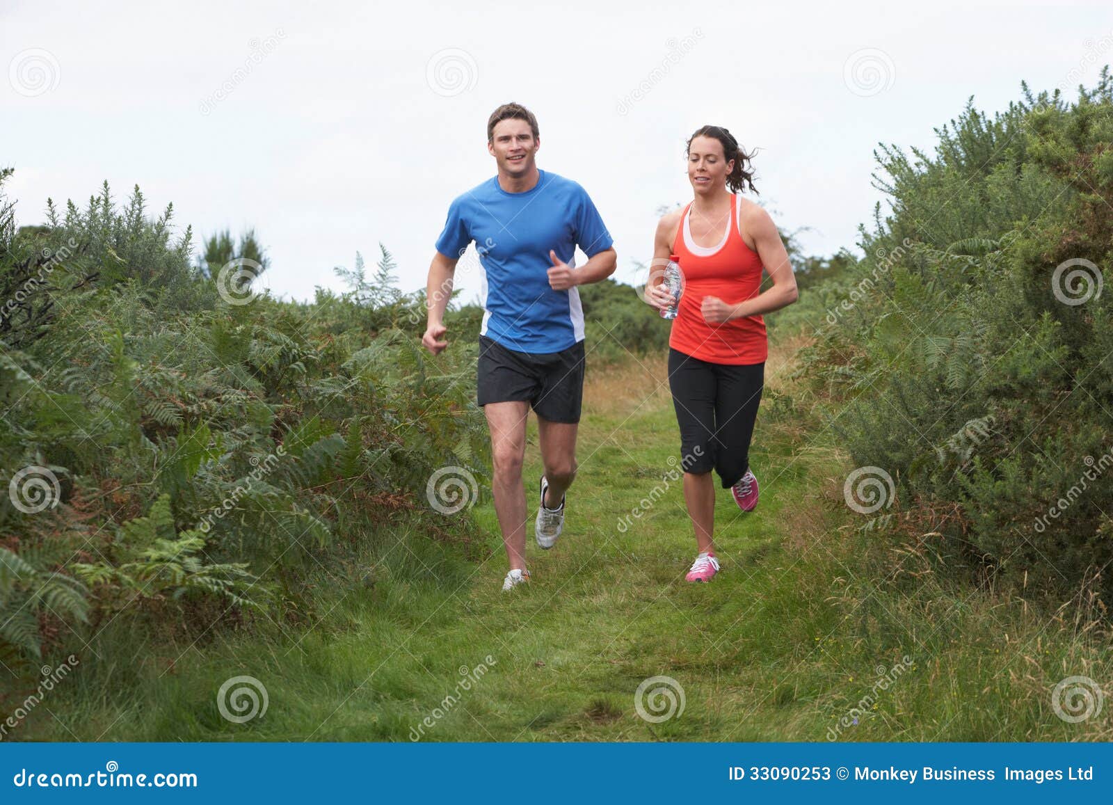 Couple on Run in Countryside Stock Image - Image of countryside ...