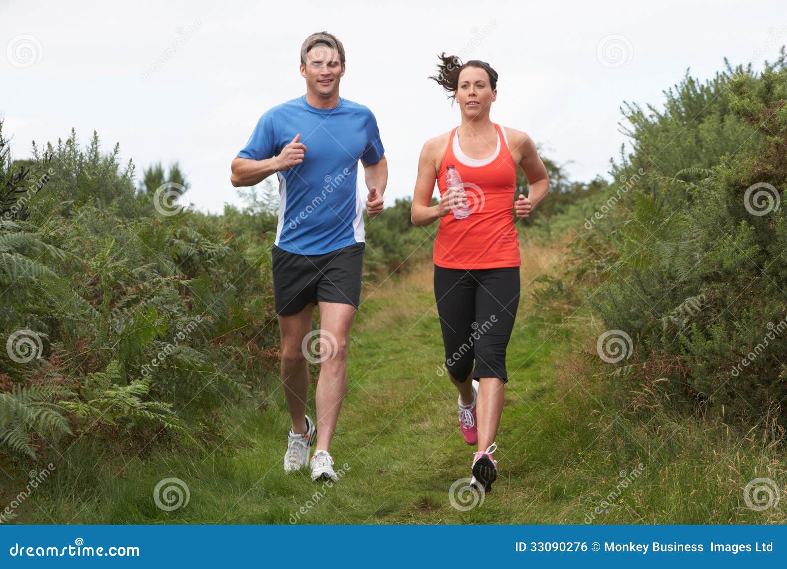 Couple on Run in Countryside Stock Photo - Image of nature, person ...