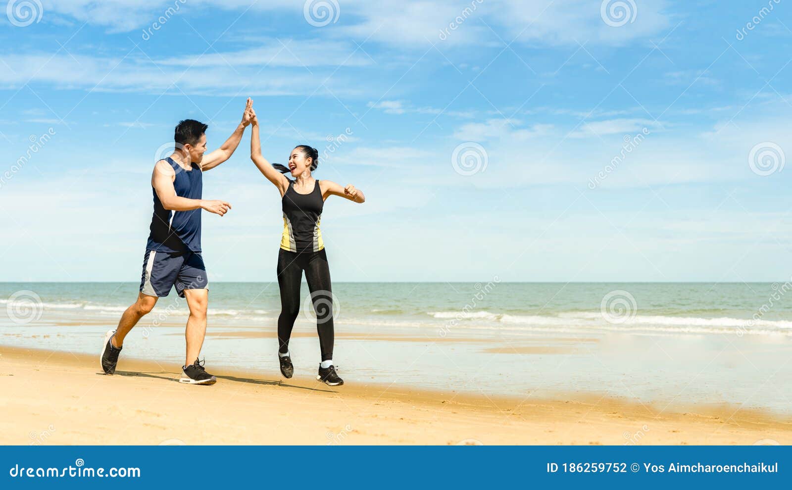 Couple Runners Jump and Touch Hands and Congratulate when Able To ...