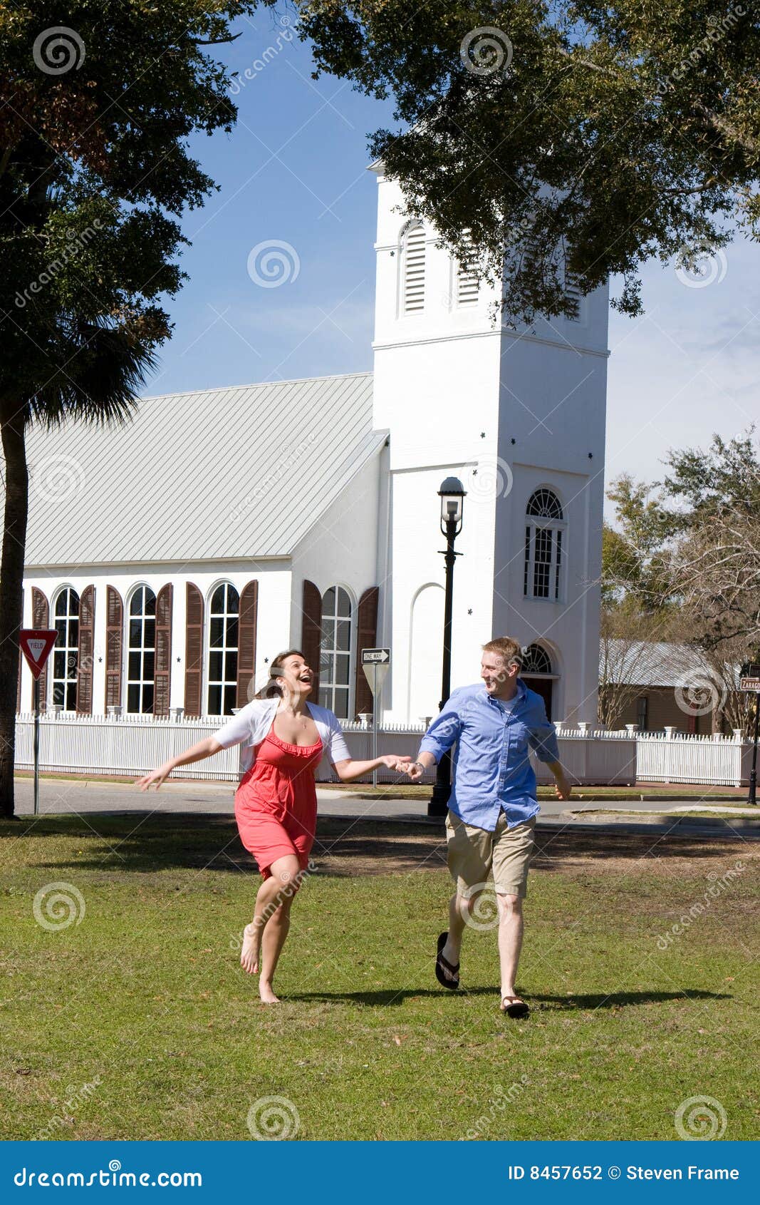 Couple Running by Church stock photo. Image of hands, church - 8457652