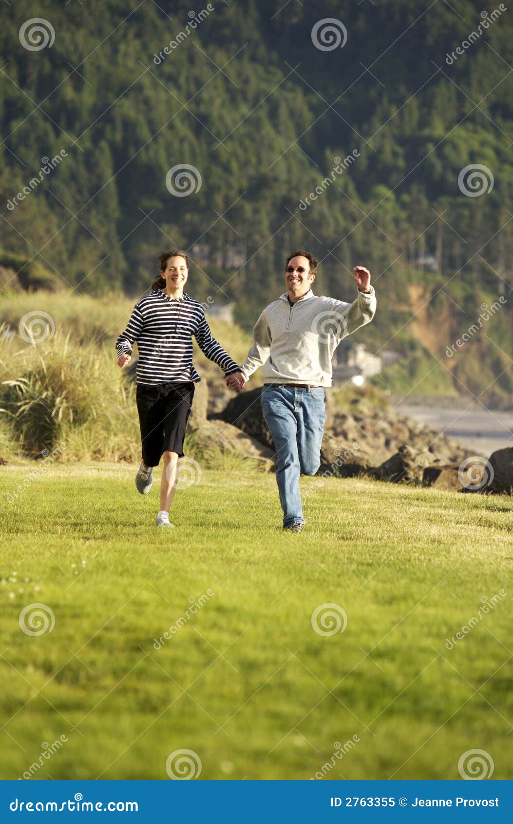 Couple Holding Hands Running