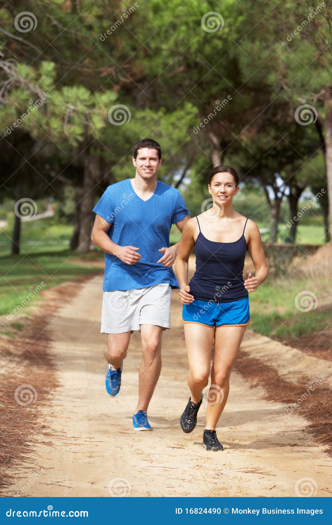 Couple running in park stock photo. Image of caucasian - 16824490