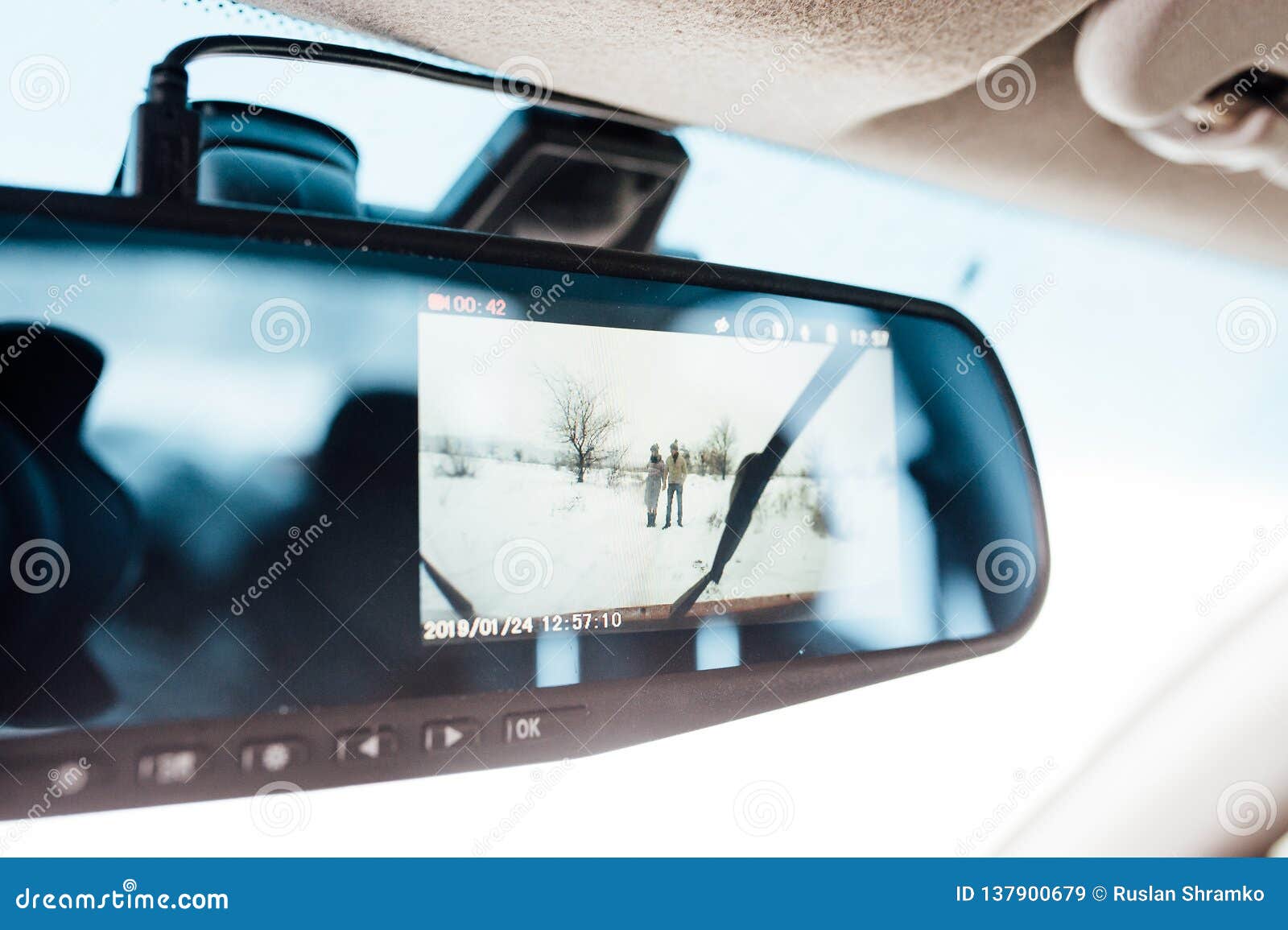 Couple Running in the Snow. View through the Screen of the DVR Stock ...
