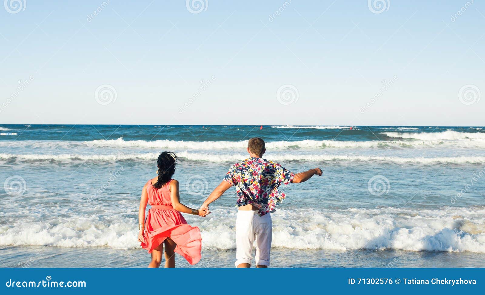Couple Running through Waves on Beach Holiday Stock Photo - Image of ...