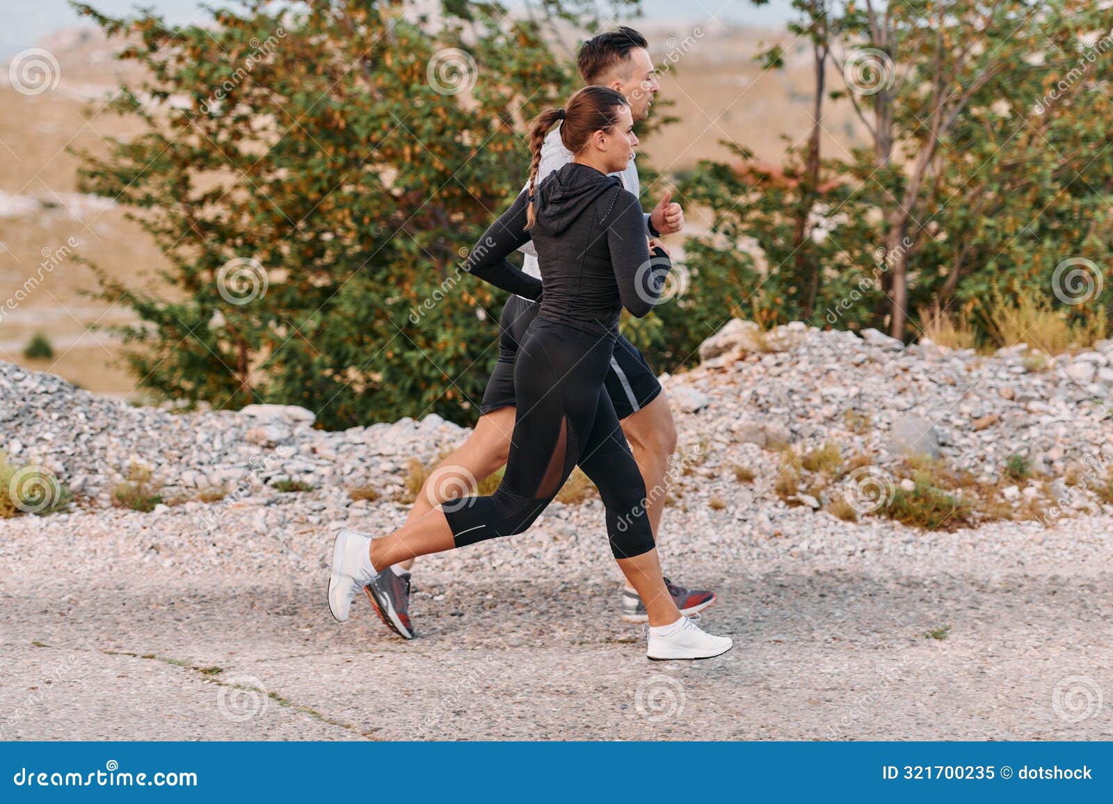 A Couple& X27;s Energizing Morning Run in the Mountains Stock Image ...