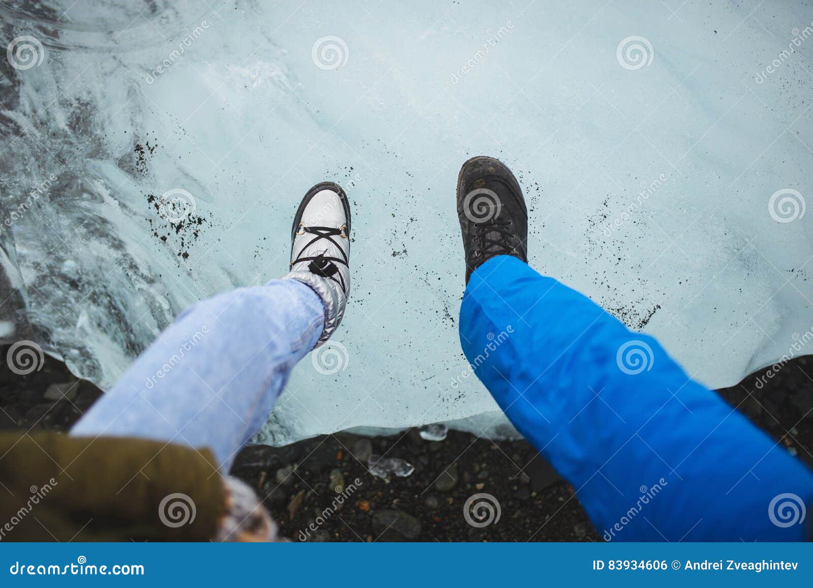 Couple`s Feet on Ice Block stock photo. Image of holding - 83934606